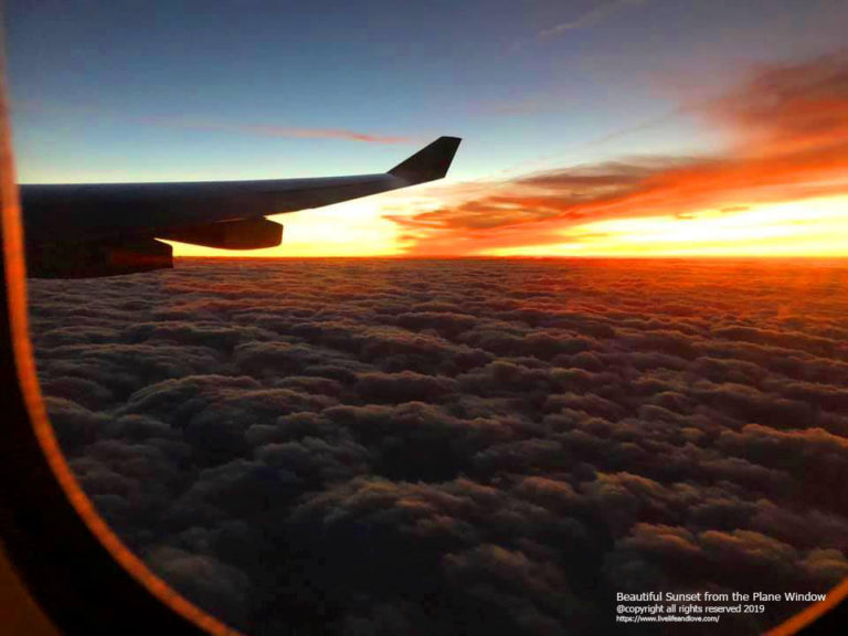 Viewing the Sunset Through an Airplane Window | Live Life and Love